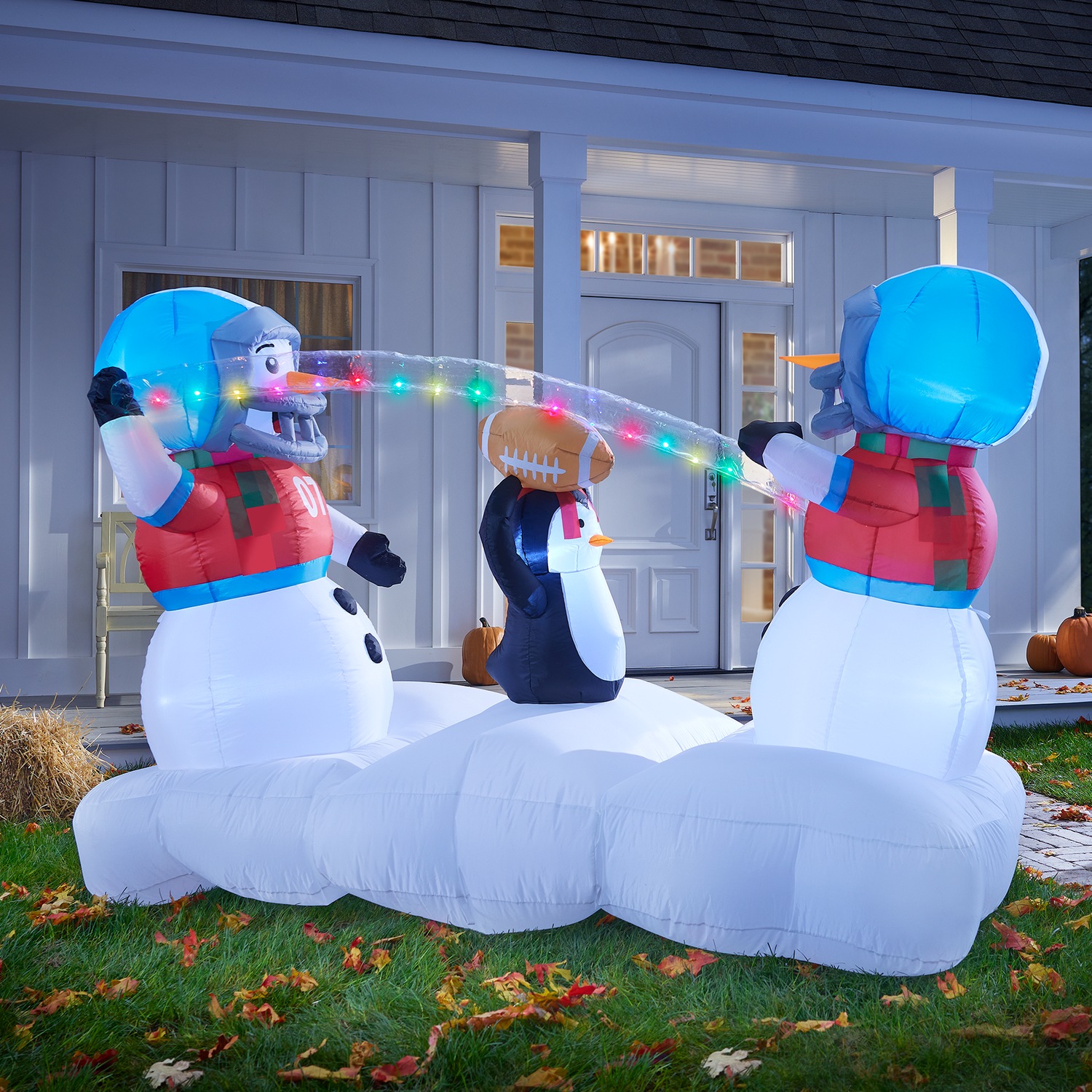 Lit Snowmen Playing Football Inflatable | Ginny's